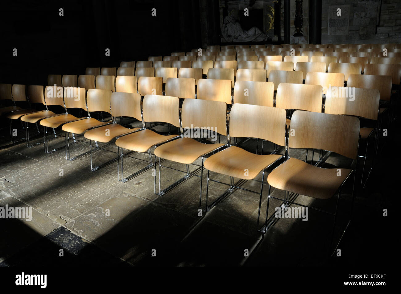 Rows of empty chairs in sunlight Stock Photo - Alamy