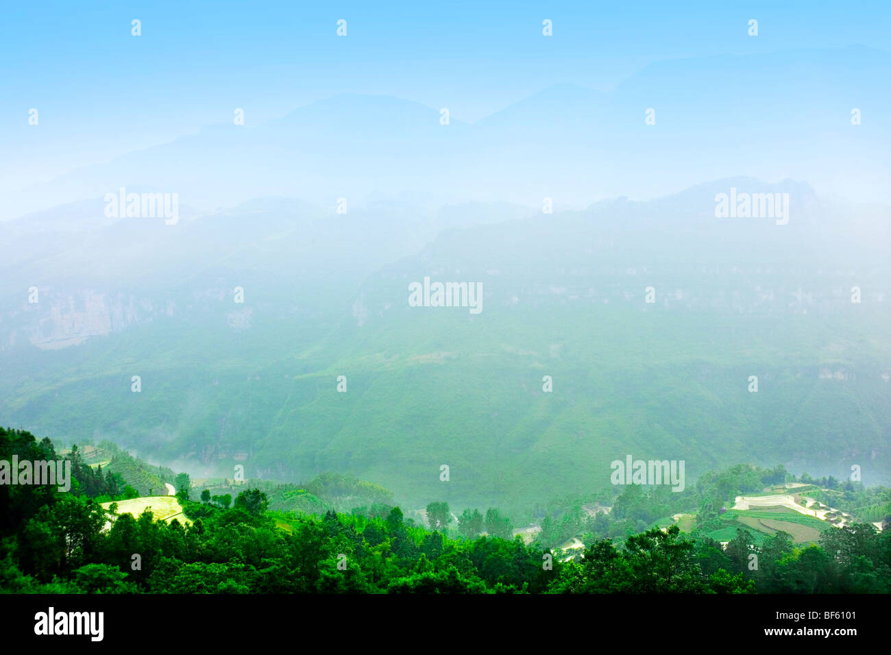Majestic mountain range in mist, Tenglong Cave Scenic Area, Lichuan ...