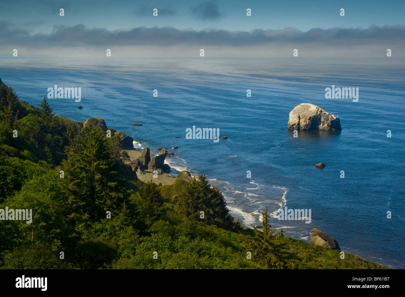 Coastal fog over the rugged hills and ocean, Redwood National Park ...