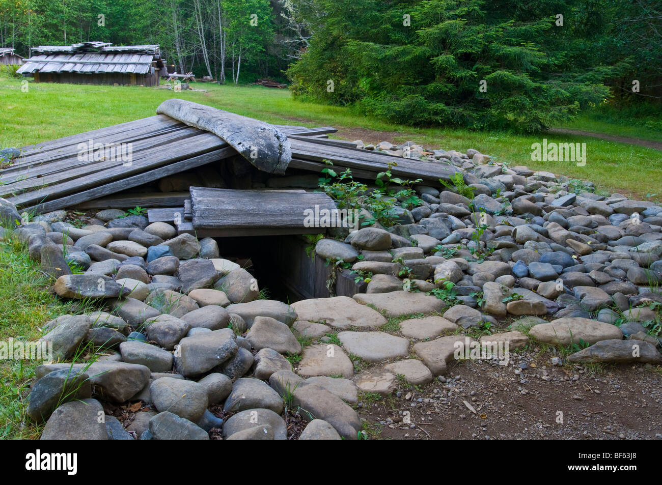 Reconstruction of traditional native american Yurok Indian lodges at ...
