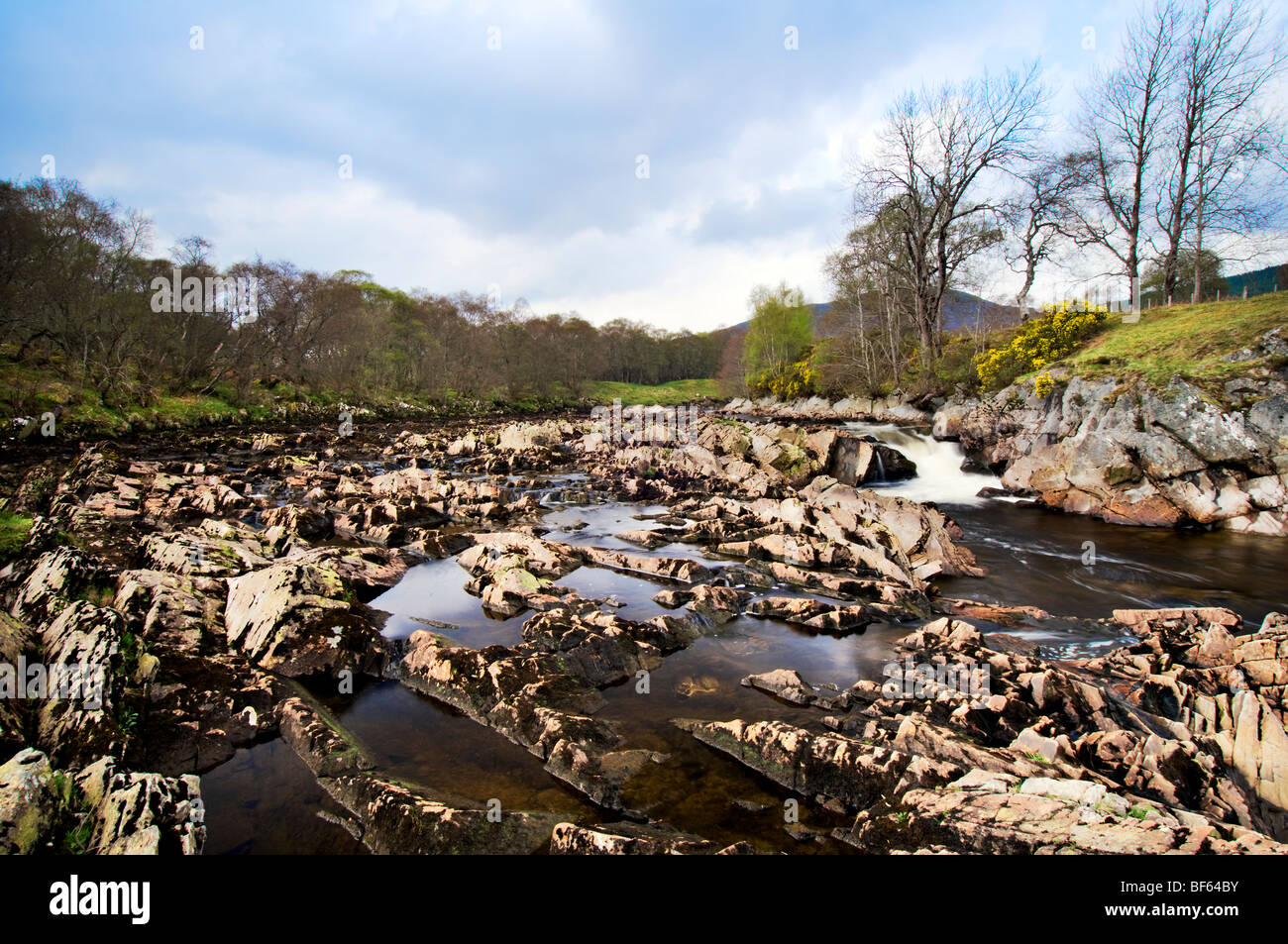 River Carron along rocky patch of river taken along single track road ...