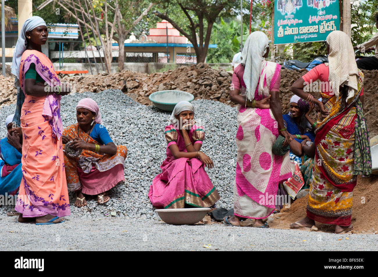 indian women working on the roads in Puttaparthi, Andhra Pradesh, India ...