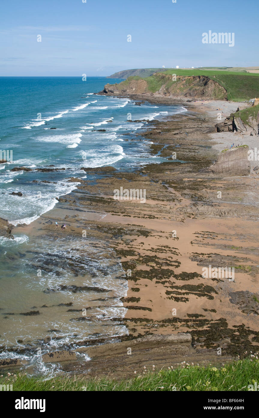 Impressive rock strata and sandy bays adorn the north Cornish coast ...