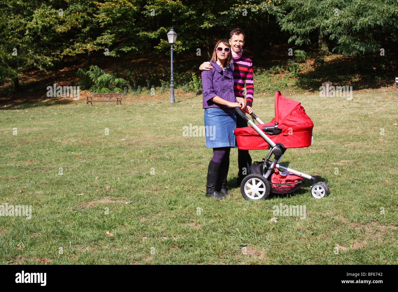 Couple and pushing pram and park hi-res stock photography and images ...