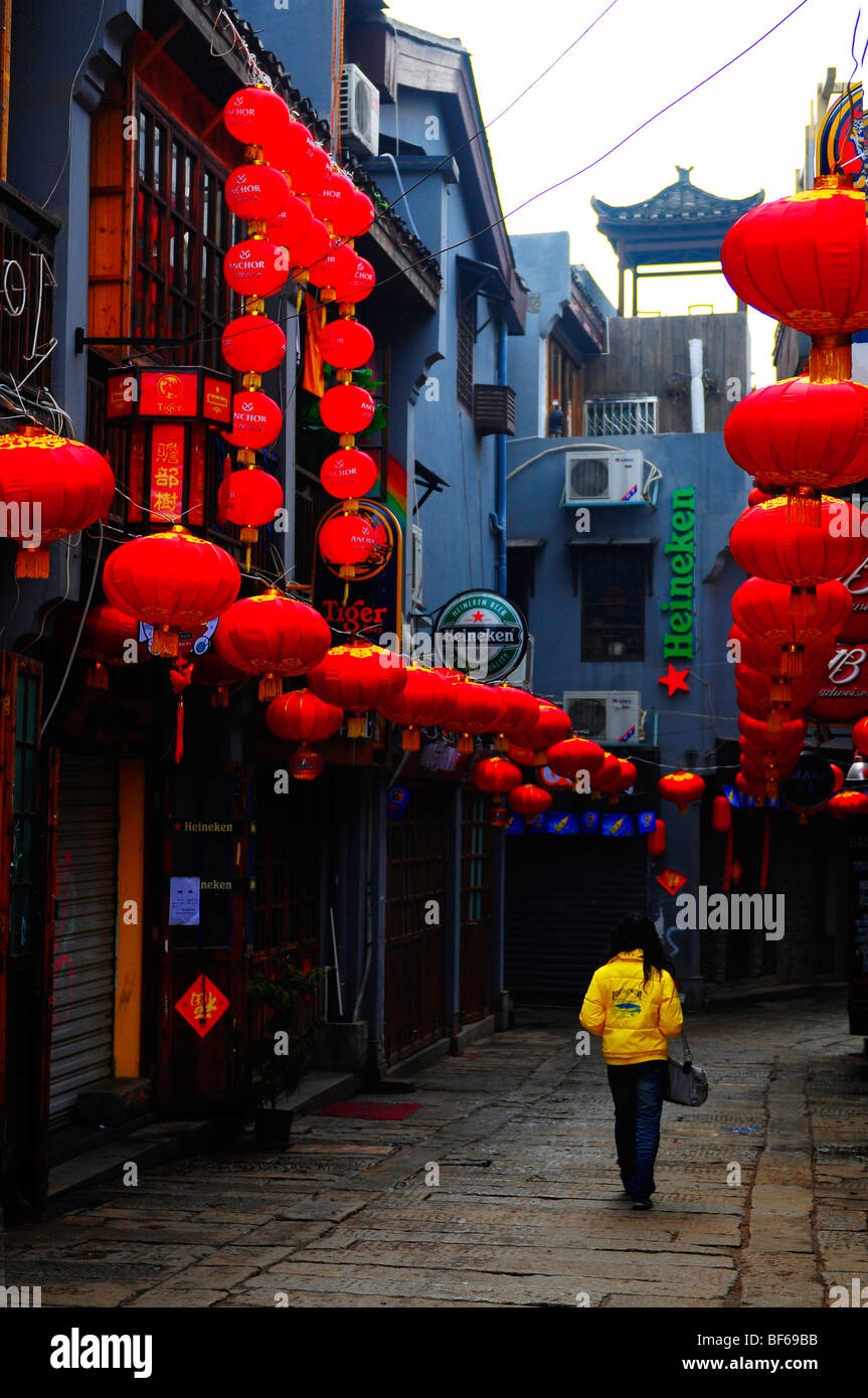 Chinese woman walking in Bar Street, Changsha City, Hunan Province ...