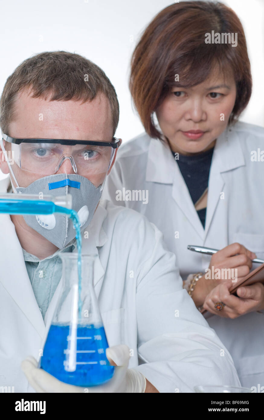 Scientific team in the laboratory Stock Photo - Alamy