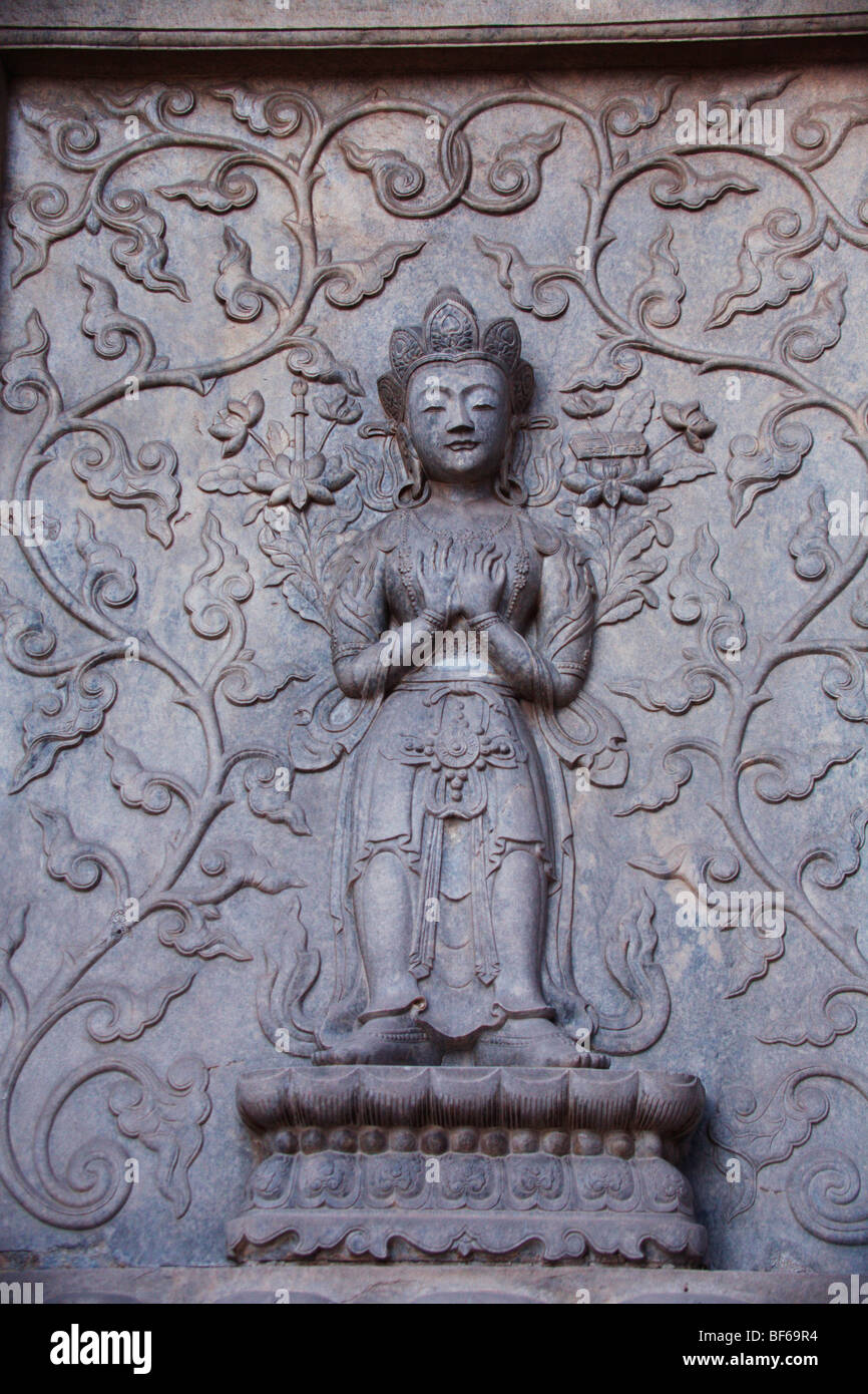 Marble wall carving of Buddha in Vajrasana Pagoda, Biyun Temple ...