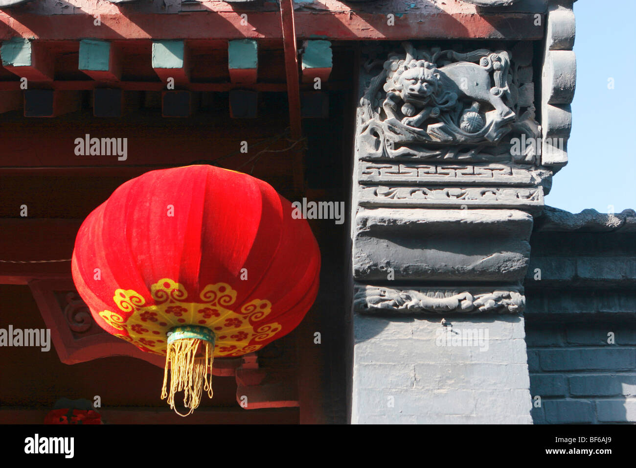 Gable board decorated with elaborate brick carving in a Hutong ...