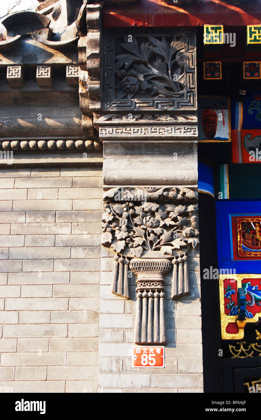 Gable board decorated with elaborate brick carving in a Hutong ...