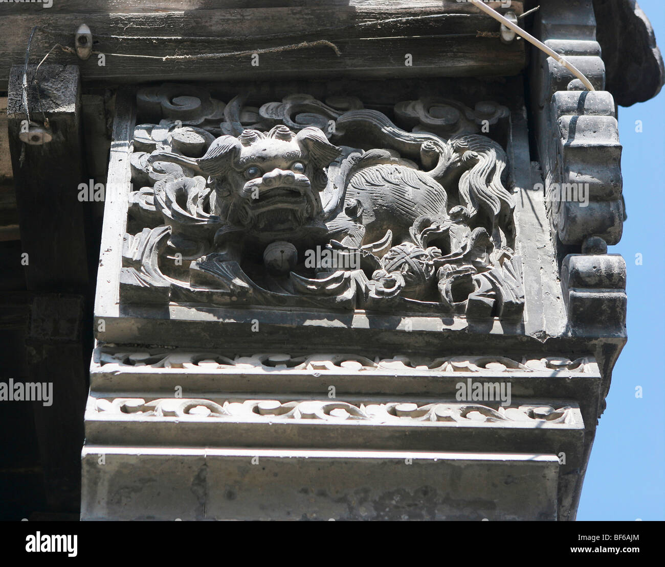 Gable board decorated with elaborate brick carving in a Hutong ...