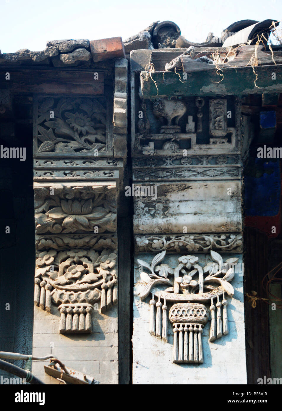 Gable board decorated with elaborate brick carving in a Hutong ...