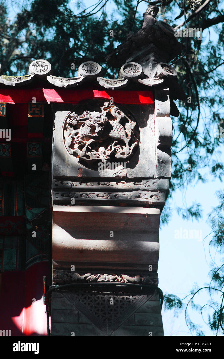 Gable board decorated with elaborate brick carving in a Hutong ...
