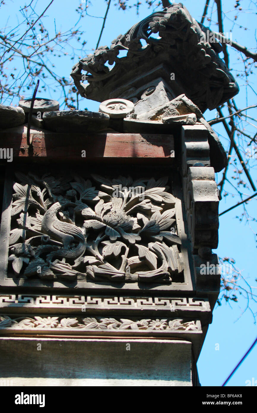 Gable board decorated with elaborate brick carving in a Hutong ...