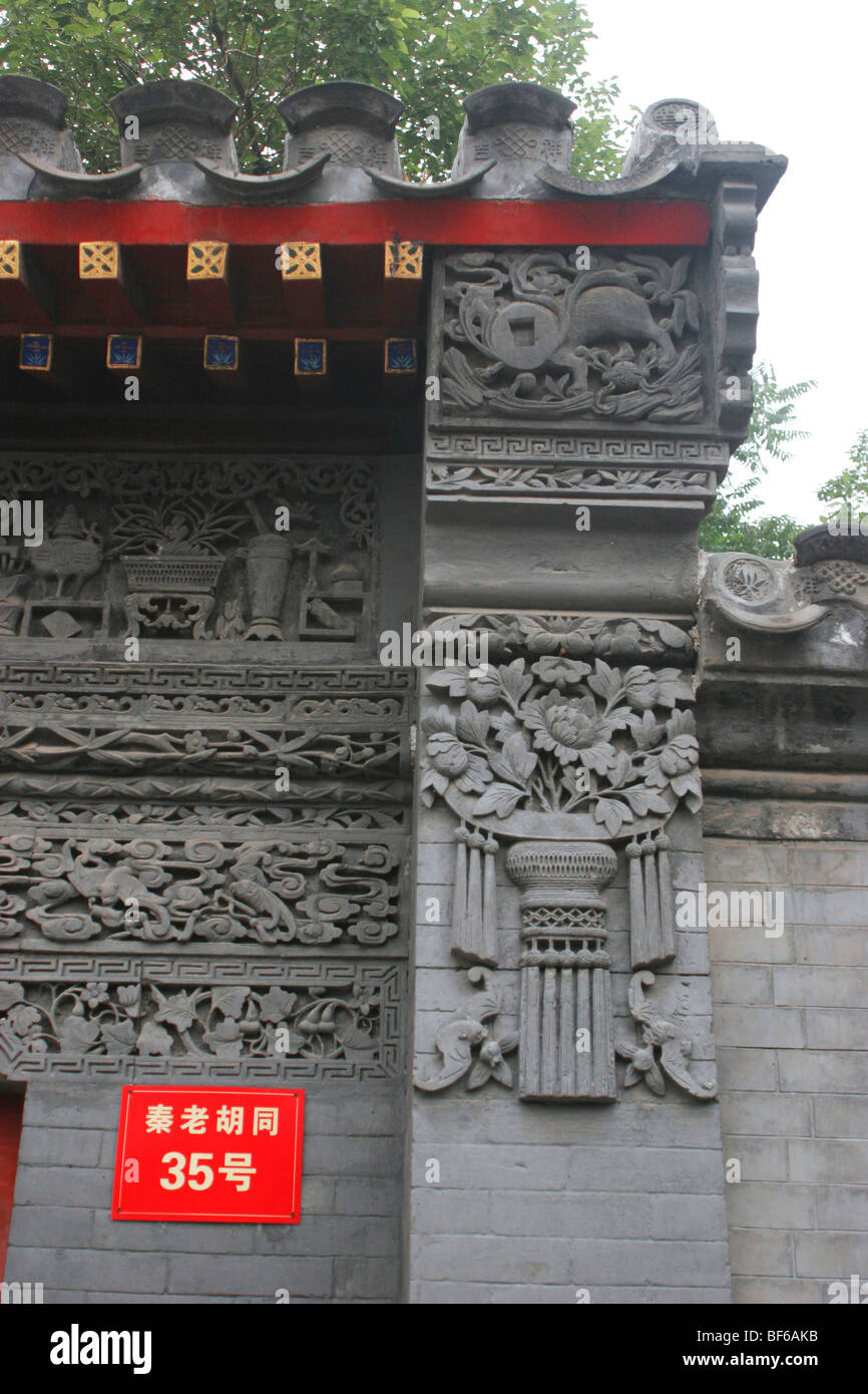 Gable board decorated with elaborate brick carving in a Hutong ...