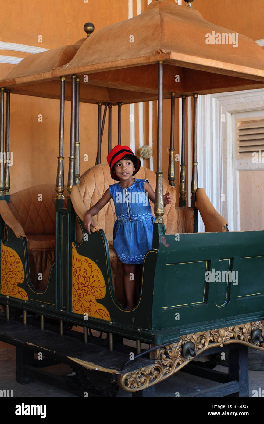 Young Indian girl in a Howdah at Chowmahalla Palace Stock Photo - Alamy