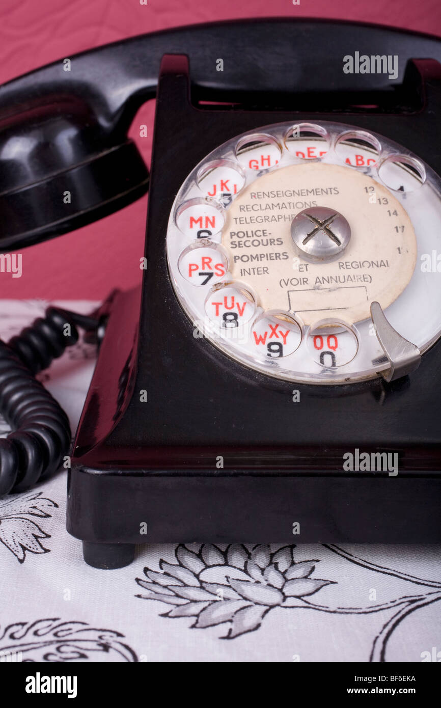 Old fashioned Bakelite phone with French text on the dial Stock Photo ...