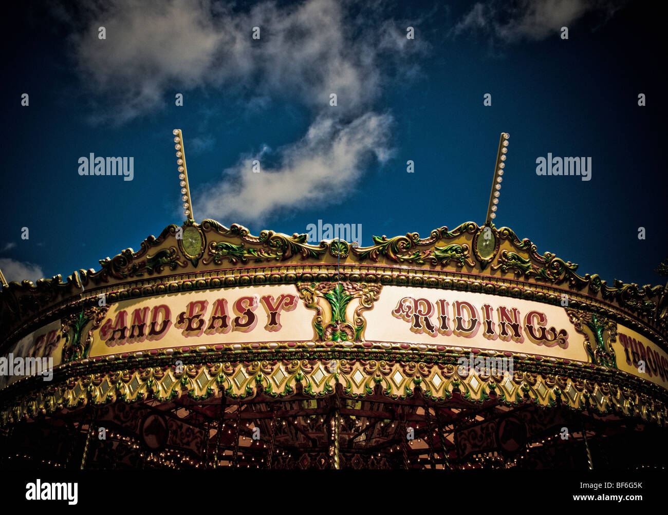 Sign on Traditional carousel - And Easy Riding Stock Photo - Alamy