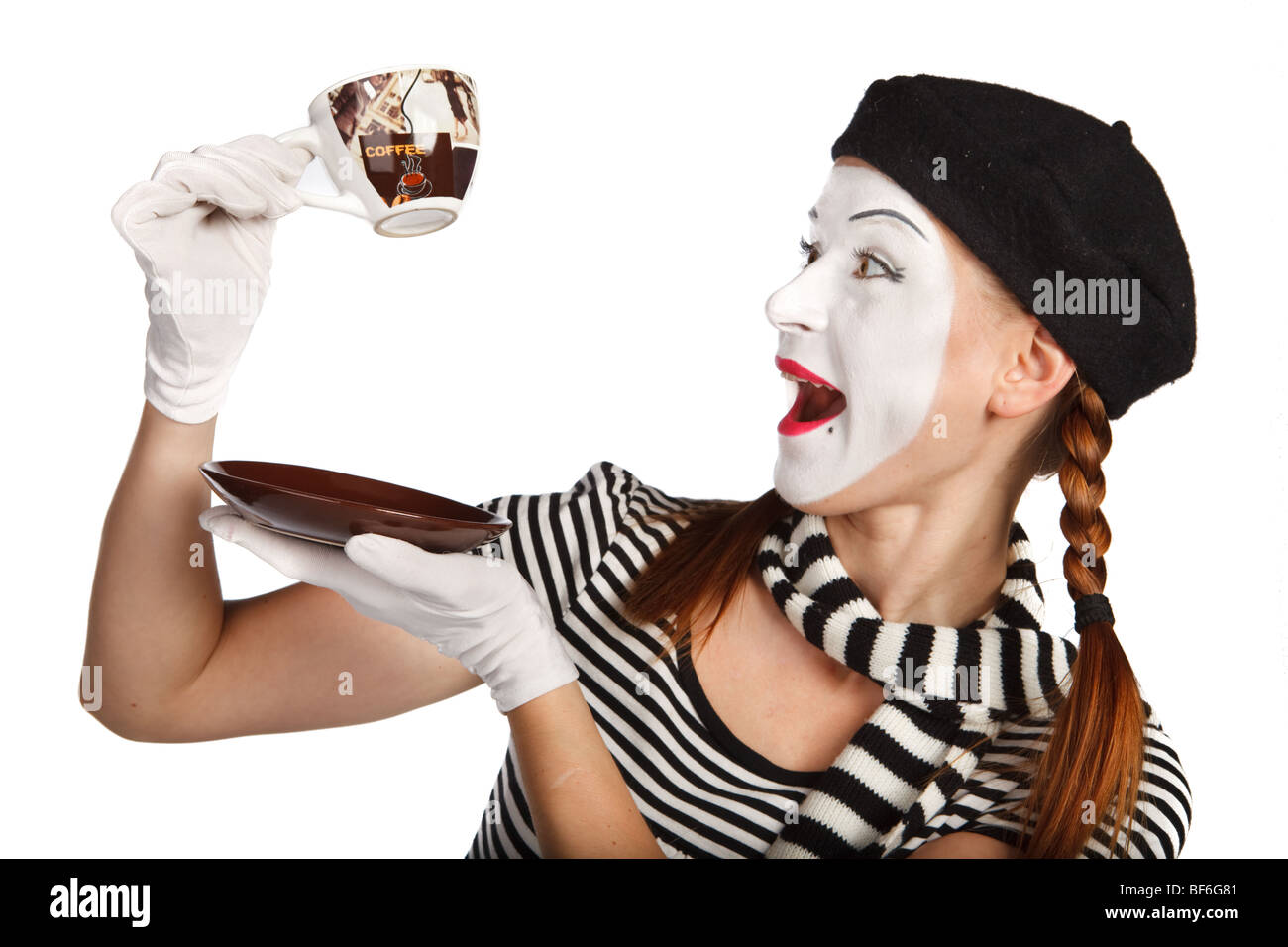 Portrait of a young lady dressed up as a mime isolated on white ...