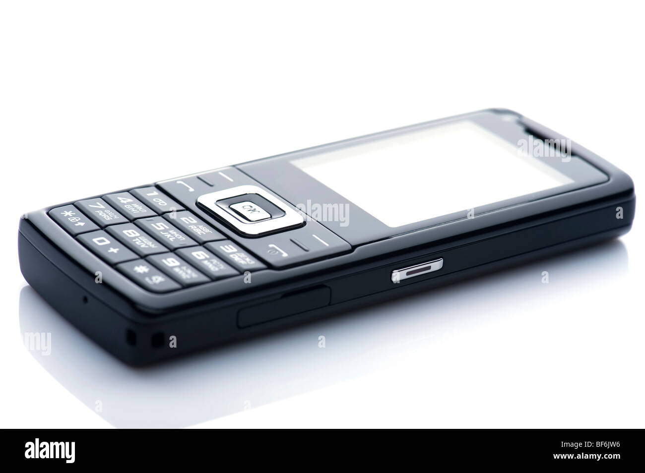 object on white - mobile phone with head set Stock Photo - Alamy