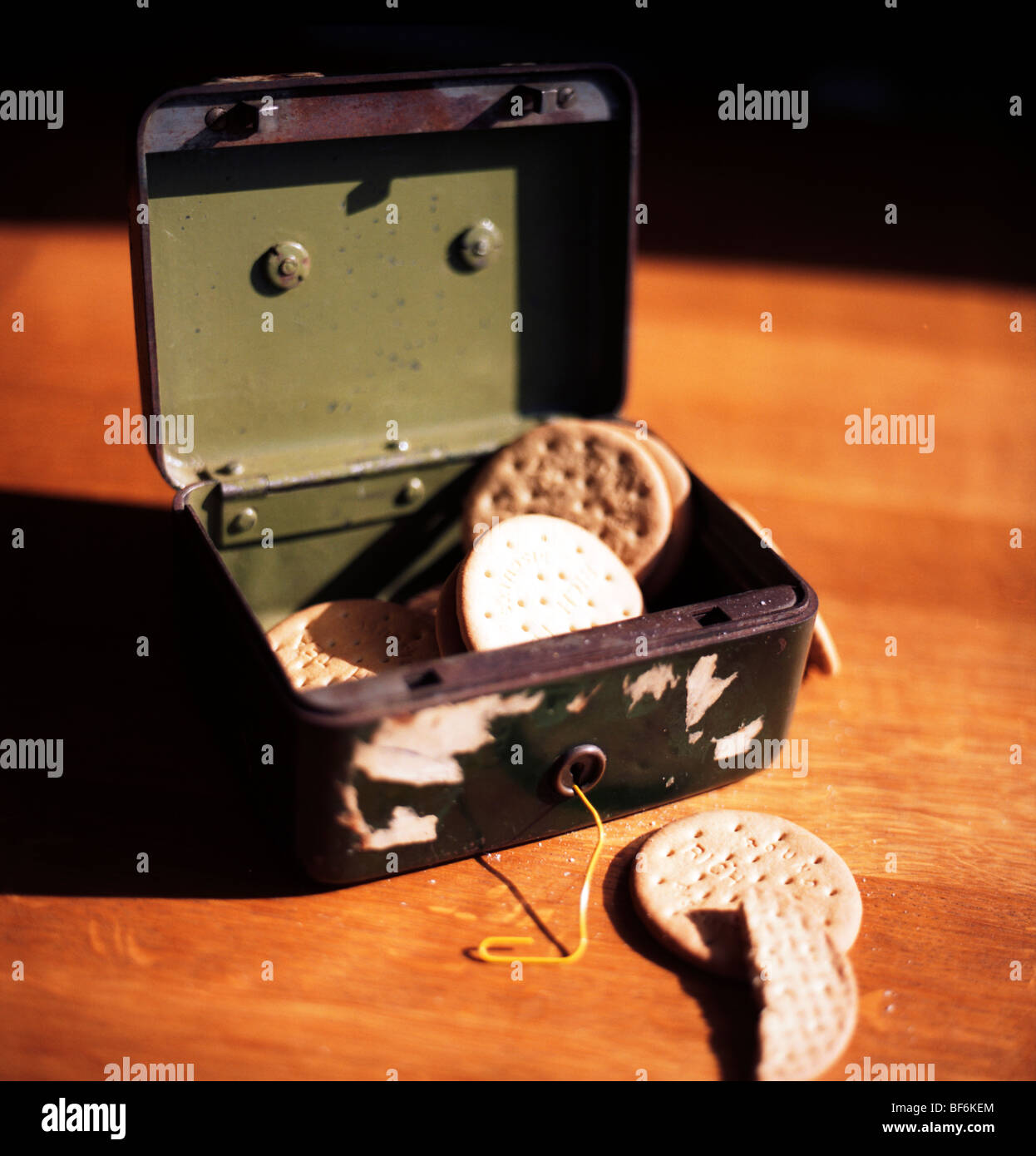 old strongbox picked lock and biscuits Stock Photo - Alamy