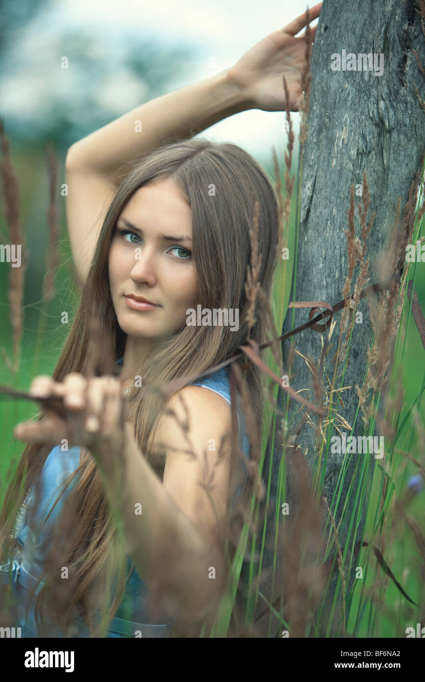 Young woman outdoors calm portrait Stock Photo - Alamy