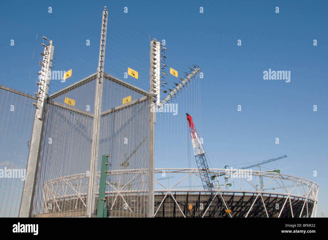 UK. SECURITY PYLONS BY FUTURE OLYMPIC STADIUM GOING UP IN MARCH'09 ...