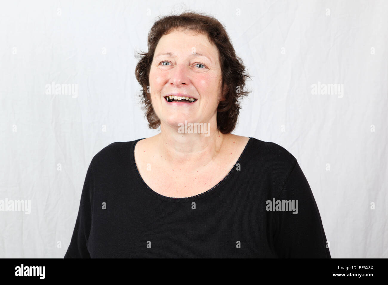 50s 60s woman smiling laughing looking happy and relaxed Stock Photo ...