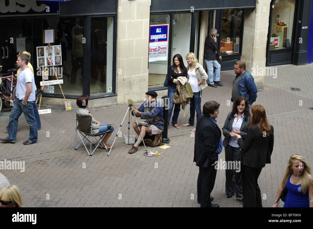 artist paintin portraits in street Stock Photo - Alamy