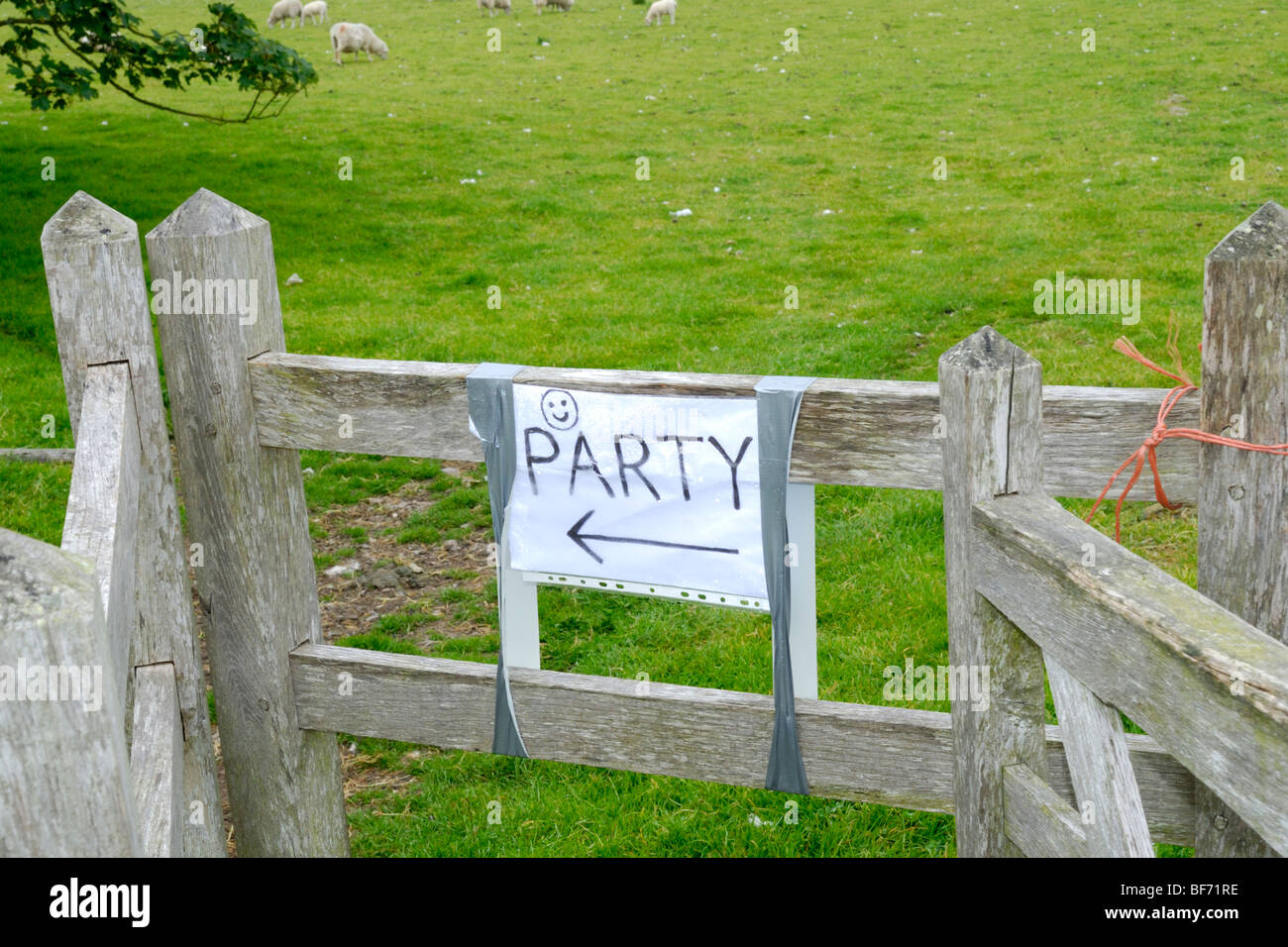 Sign for an outdoor party at Rhoscolyn, Anglesey, North Wales Stock ...