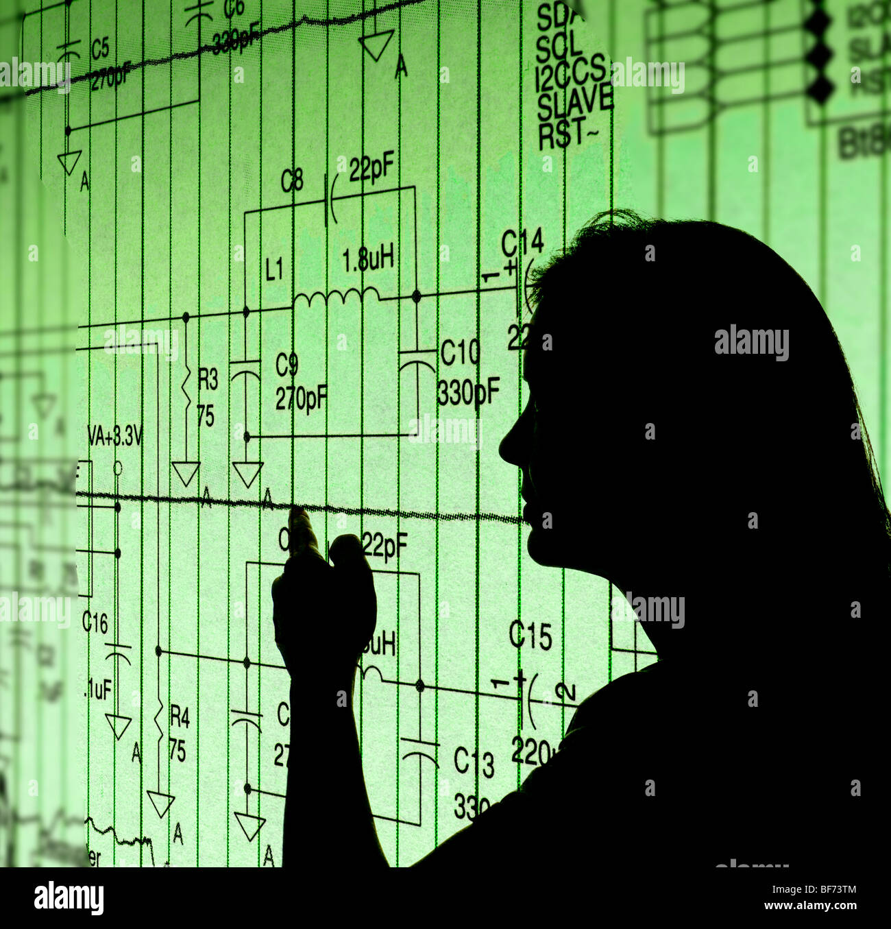 woman electrical engineer checking projected grid printout Stock Photo ...
