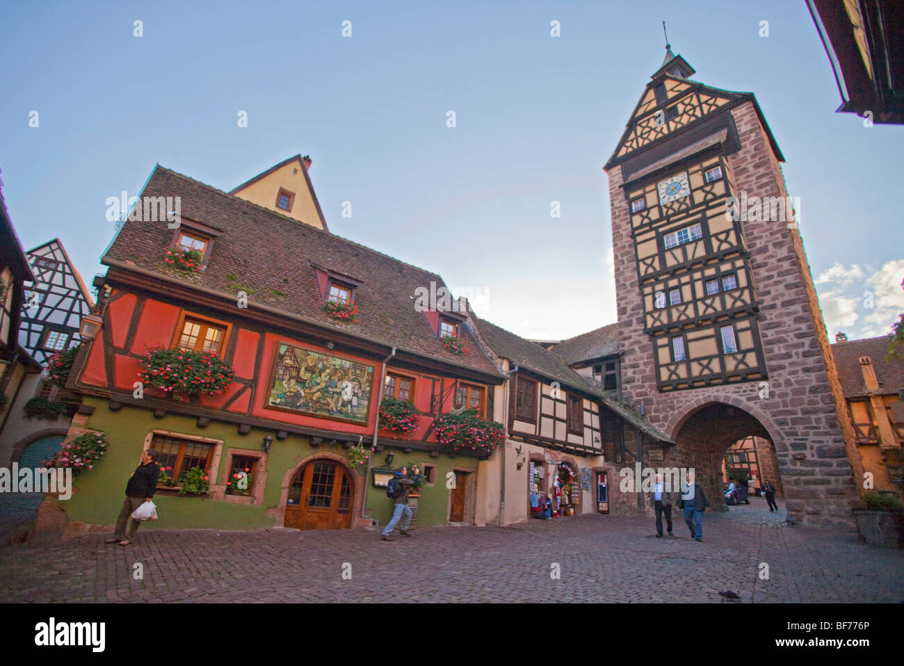 Typical colourful Alsacian House, Dolder Tower in Riquewihr Alsace Haut ...