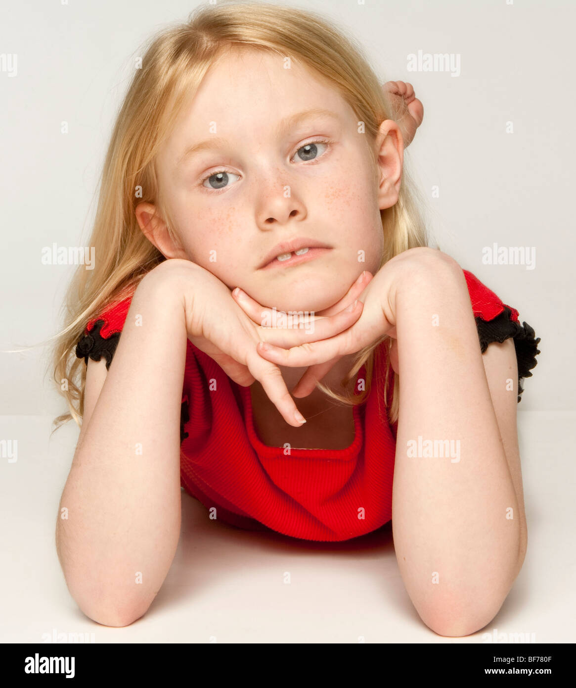 Young caucasian girl looking wistful, sad Stock Photo - Alamy
