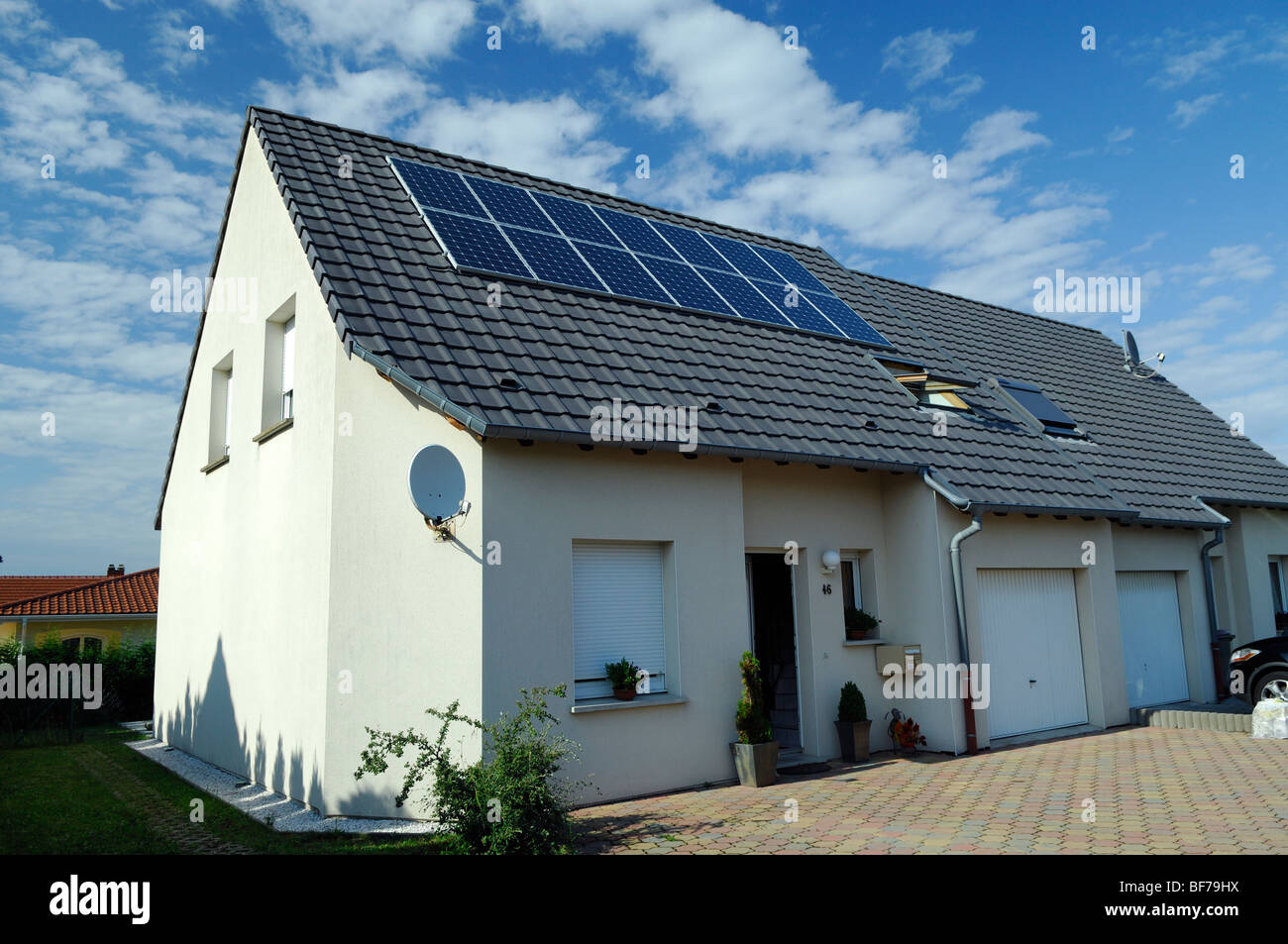 photovoltaic solar power energy panels on the roof of a private house ...