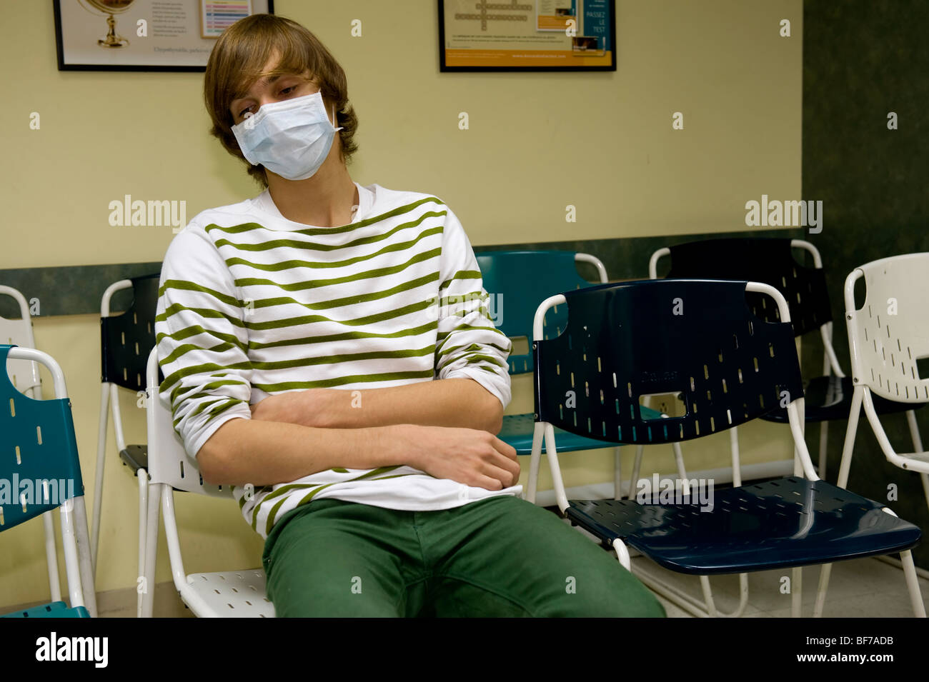 16 years old boy with mask that got swine flu H1N1 Stock Photo - Alamy