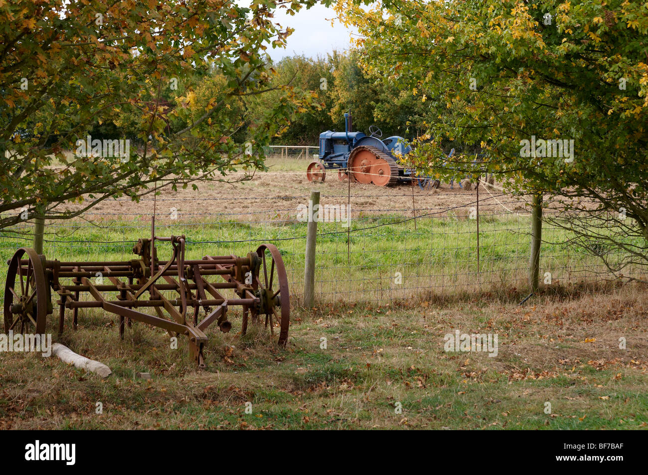Vintage farming scene with old machinery Stock Photo - Alamy