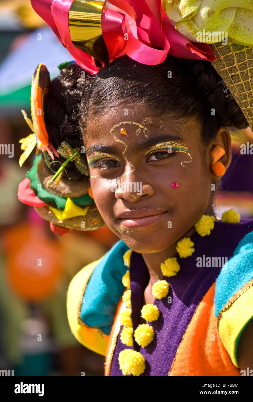 Young girl poses for the camera at the carnival parade in Curacao, ABC ...