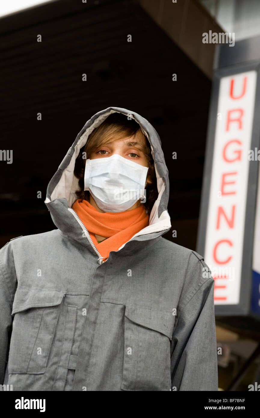 16 years old boy with mask that got swine flu H1N1 Stock Photo - Alamy