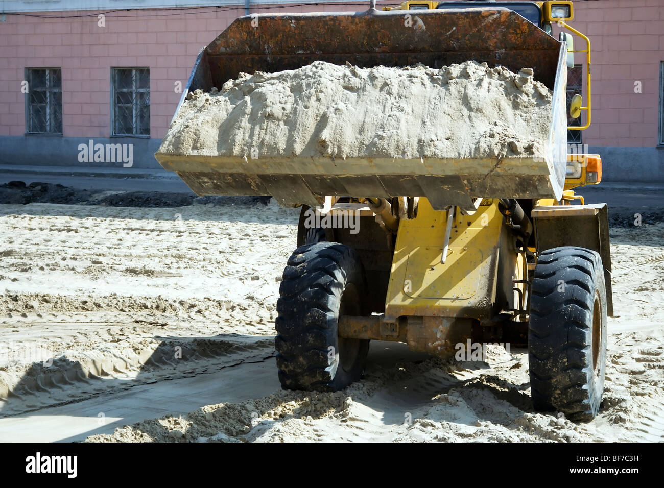 Road loader on the construction of road Stock Photo - Alamy
