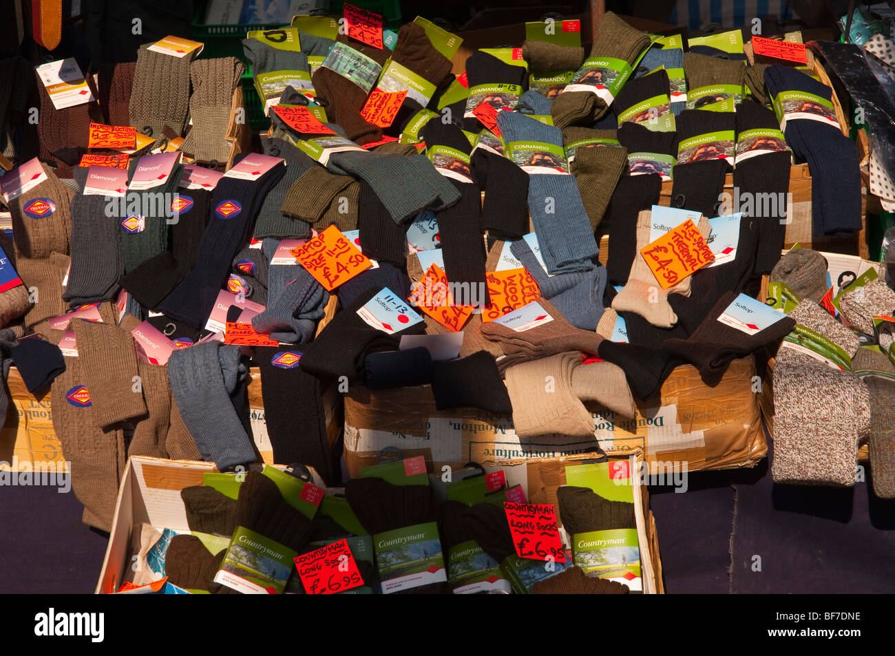 Socks for sale on an outdoor market stall in Diss,Norfolk,Uk Stock ...