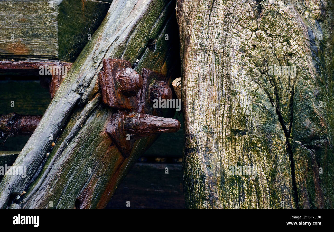Wood and rusting iron on steps down to beach Stock Photo - Alamy
