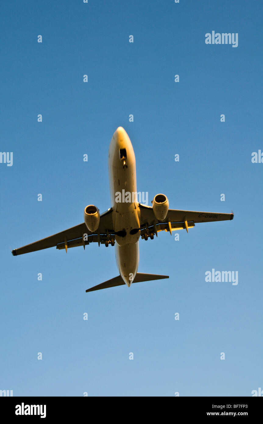 A passenger jet in flight Stock Photo - Alamy