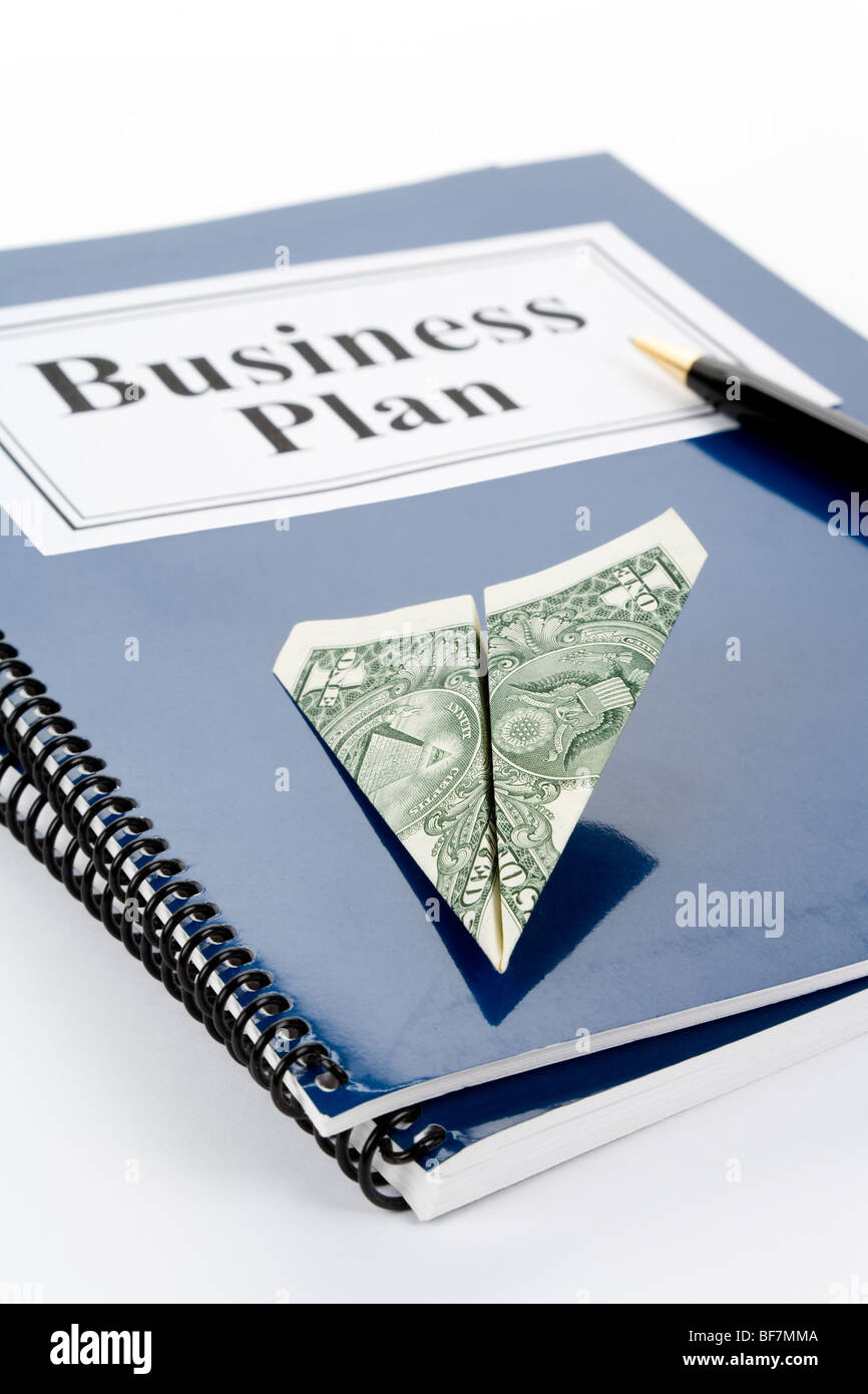 Business Plan and dollar with white background Stock Photo - Alamy