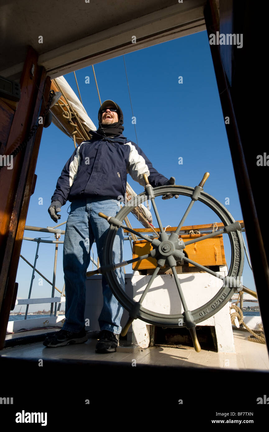 dredging oysters in Chesapeake bay on skipjack martha lewis Stock Photo ...
