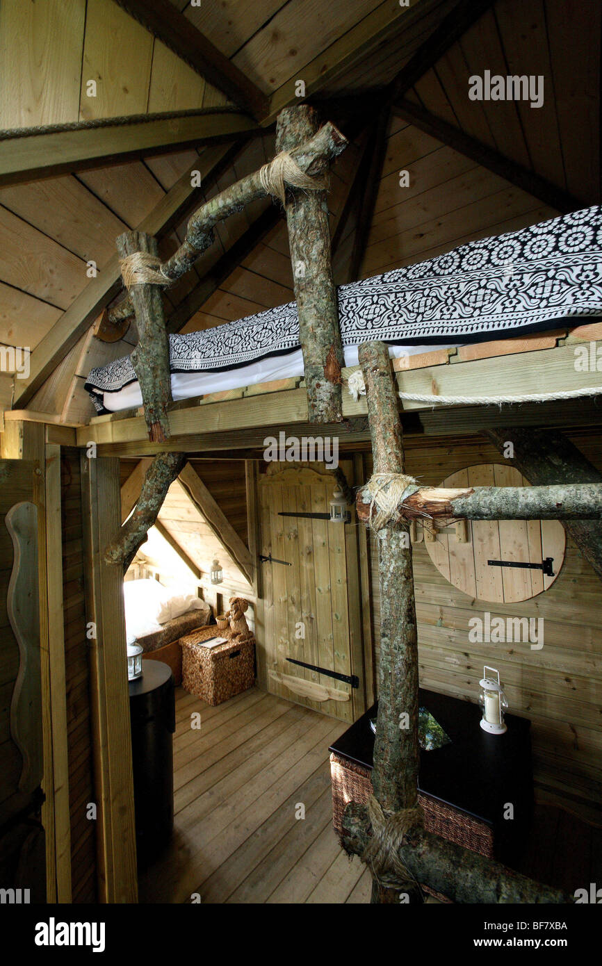 Eco-friendly housing: hut in the trees Stock Photo - Alamy