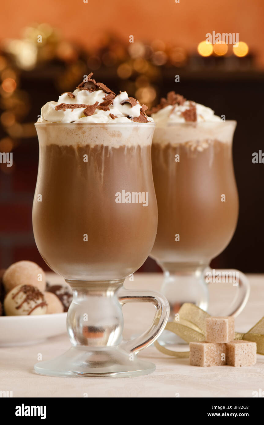 Two Irish Coffees in warm pub setting Stock Photo - Alamy
