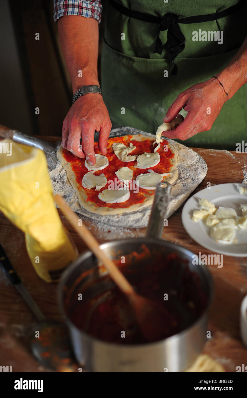 Home made pizza making, in a kitchen Stock Photo - Alamy