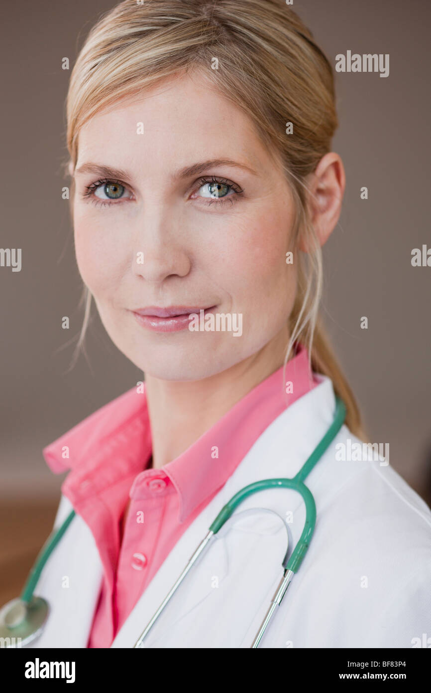female medic looking at viewer Stock Photo - Alamy