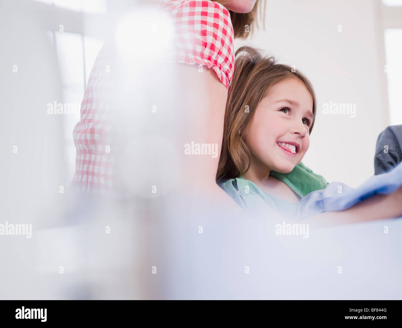 mother caring for her daughter Stock Photo - Alamy