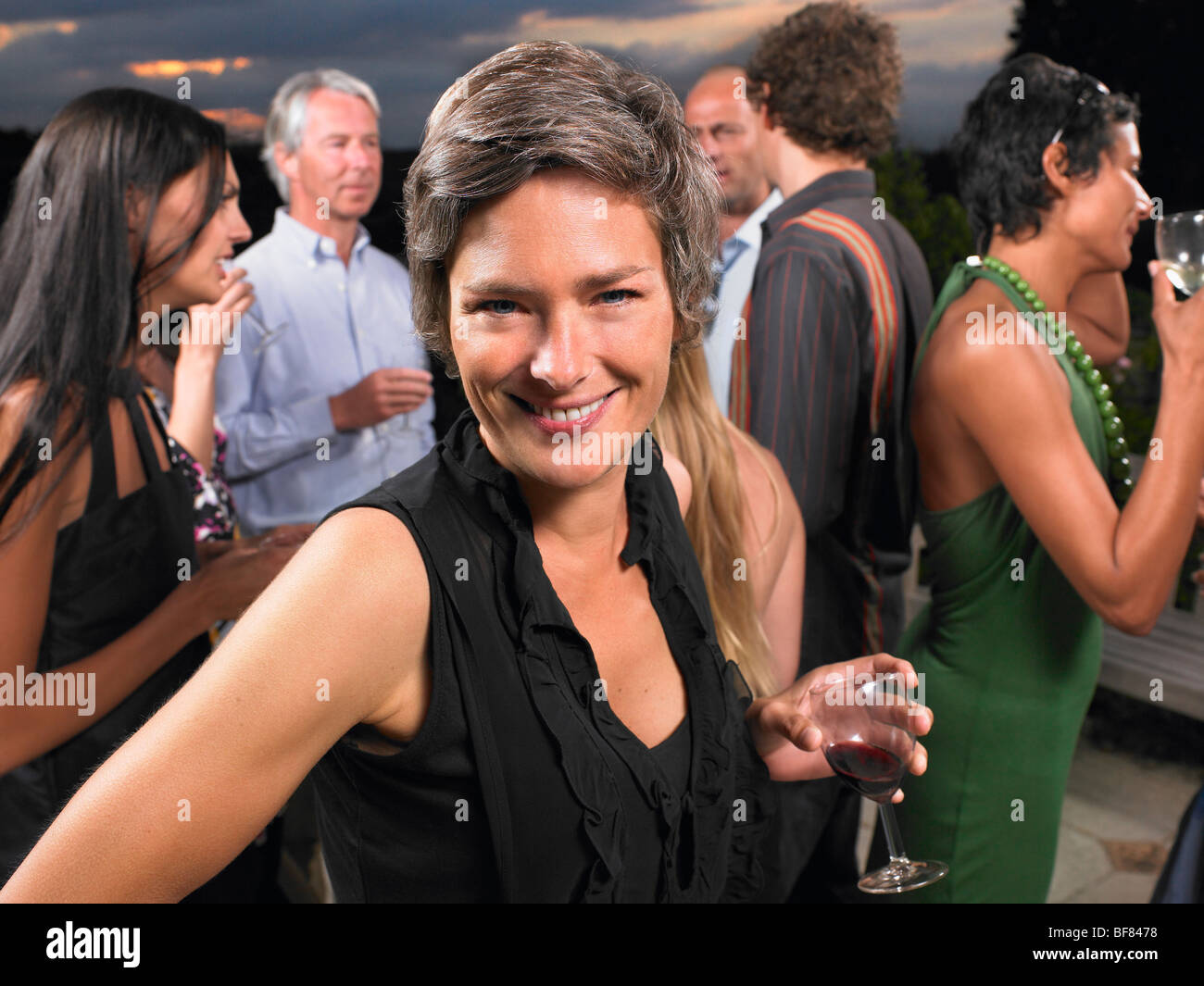 Crowd of mature people party hi-res stock photography and images - Alamy