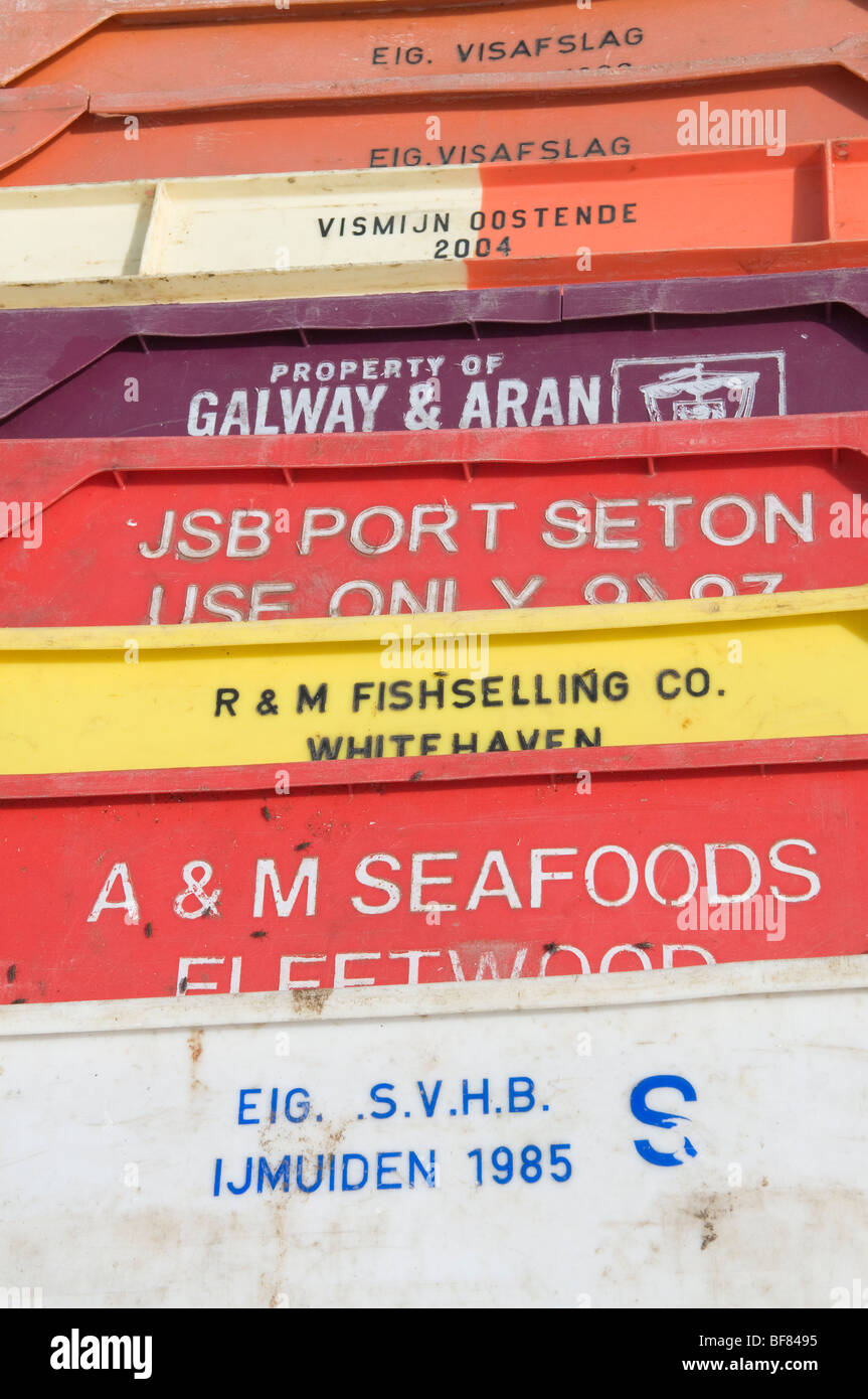 Stacked colourful fish boxes from a fishing boat Stock Photo - Alamy